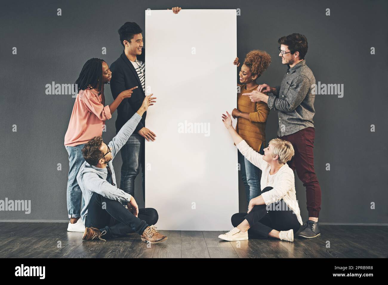 Happy group people holding banner hi-res stock photography and images ...