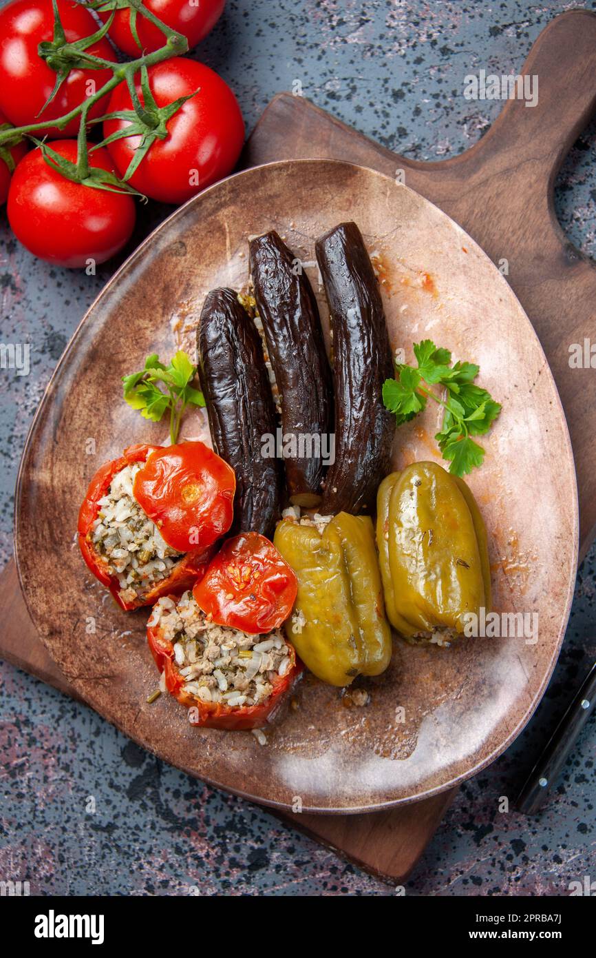 top view delicious vegetable dolma with salad on blue background food ...