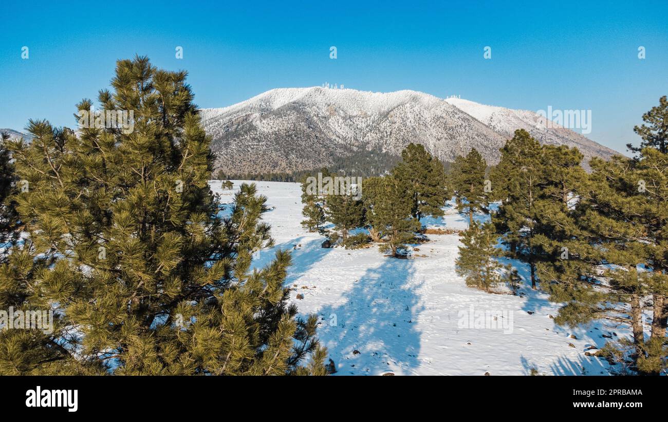 Flagstaff Arizona winter park mountain snow forest drone from air Stock ...