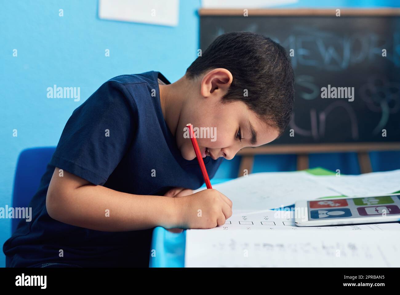 Completing a lesson hi-res stock photography and images - Alamy