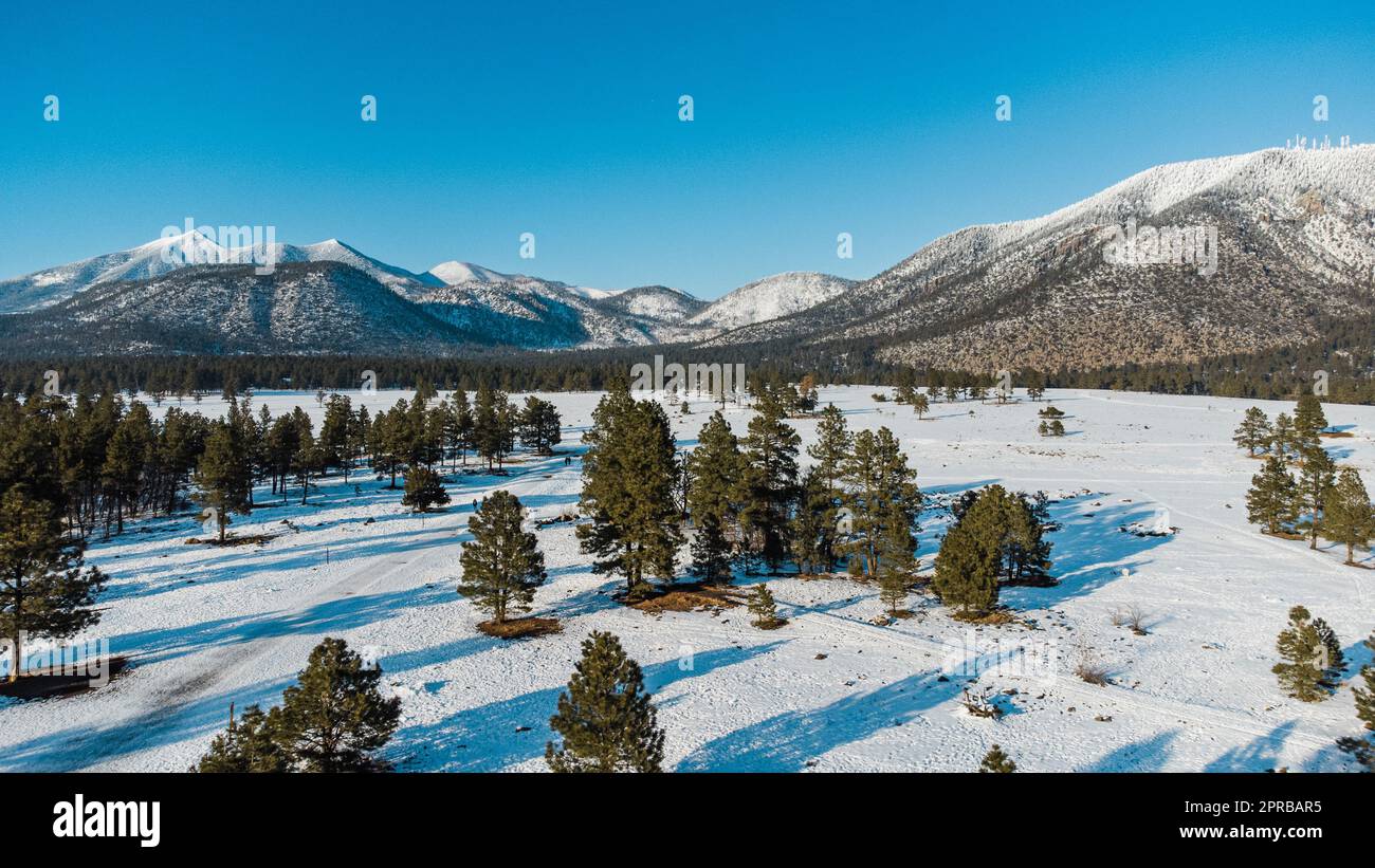 Flagstaff Arizona winter park mountain snow forest drone from air Stock ...