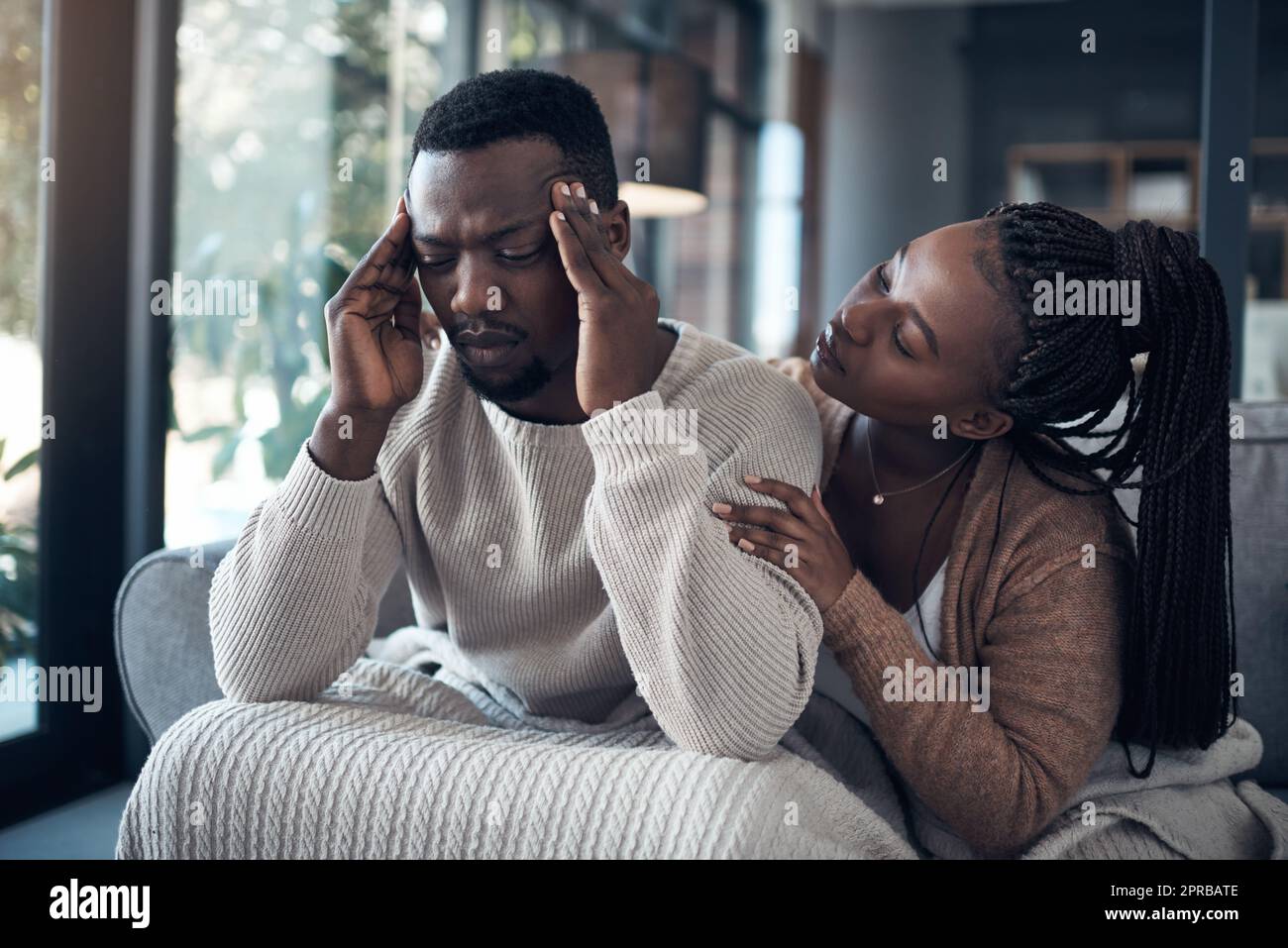 Woman comforts man hi-res stock photography and images - Alamy