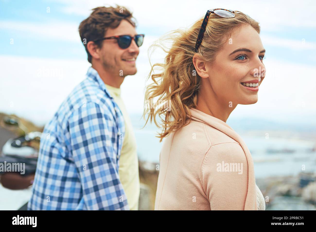 Appreciating the scenery. a young couple enjoying a day outdoors Stock ...