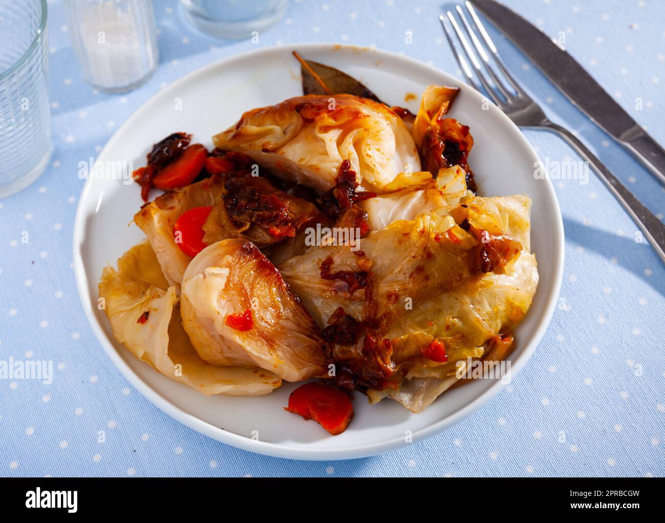 Stewed cabbage served on table Stock Photo - Alamy
