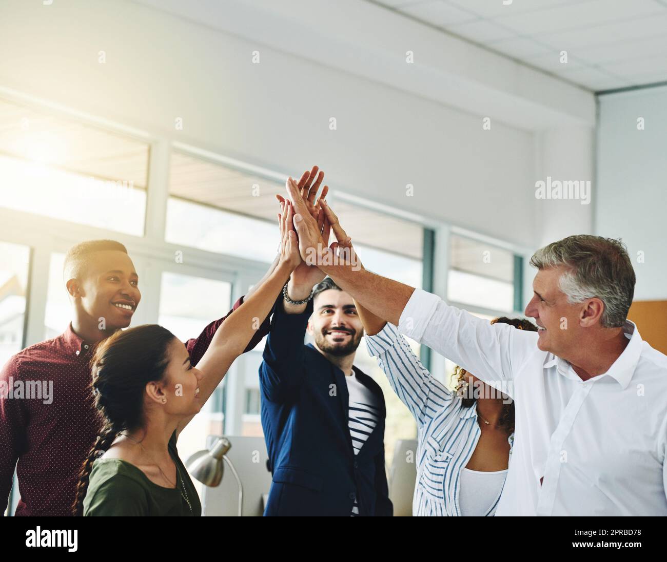 High Five Celebrating And Winning Business Team Or Cheerful Successful