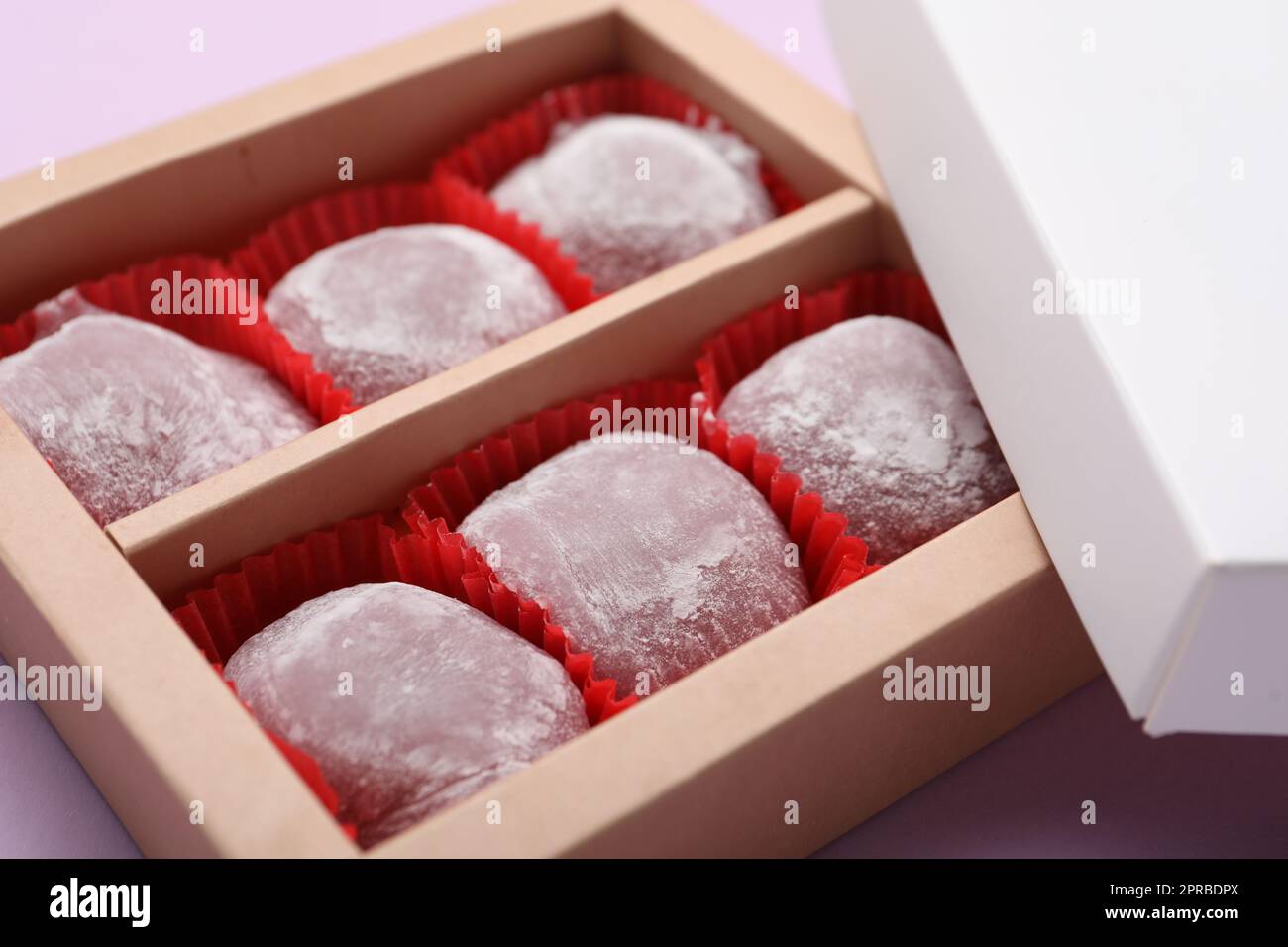 Box of delicious mochi on light background, closeup. Traditional ...
