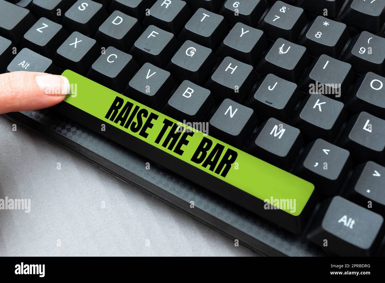 Sign displaying Raise The Bar. Business overview Set higher standards ...