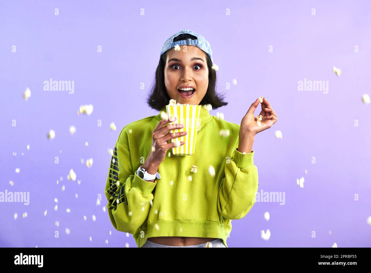 Popcorn popping person hi-res stock photography and images - Alamy