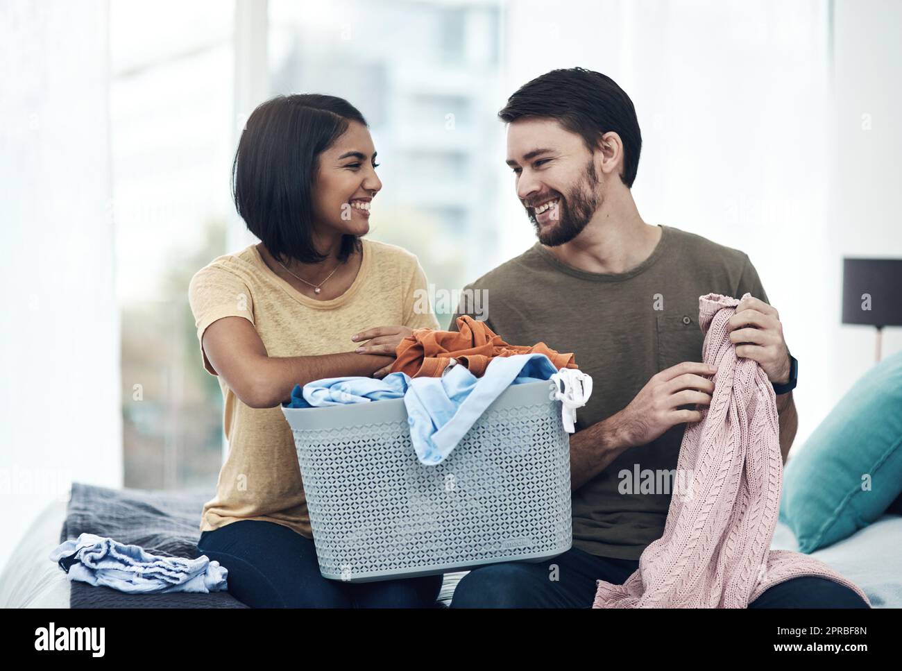 Ethnic couple cleaning house hi-res stock photography and images - Alamy