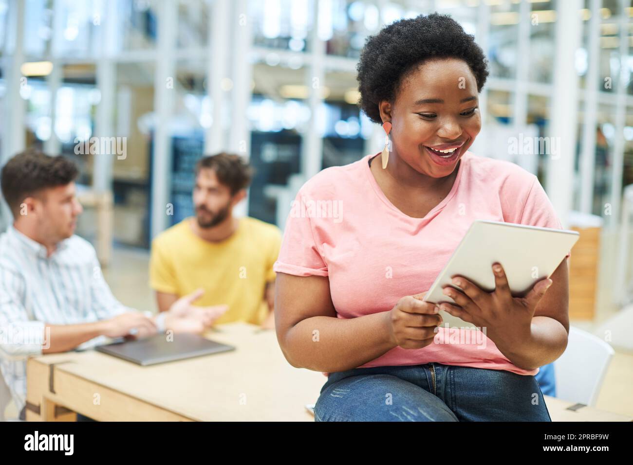 The best technology to keep her team aligned. a young businesswoman ...