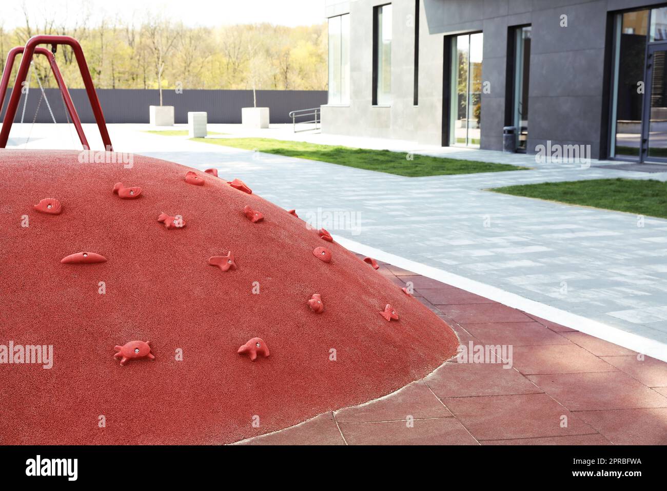 Climbing surface on outdoor playground in residential area Stock Photo ...