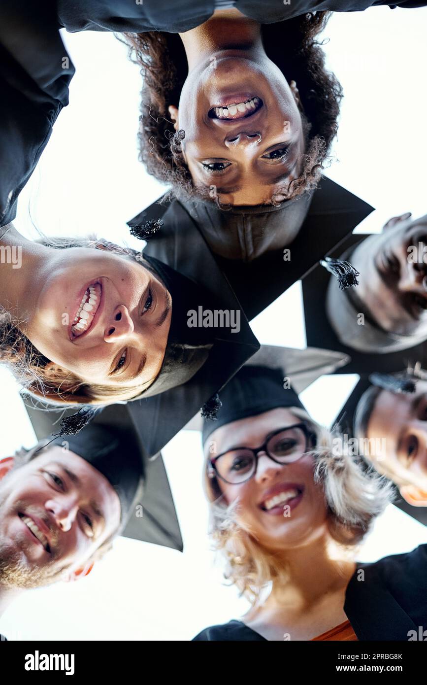 Their big smiles tell of their great success. Portrait of a group of ...