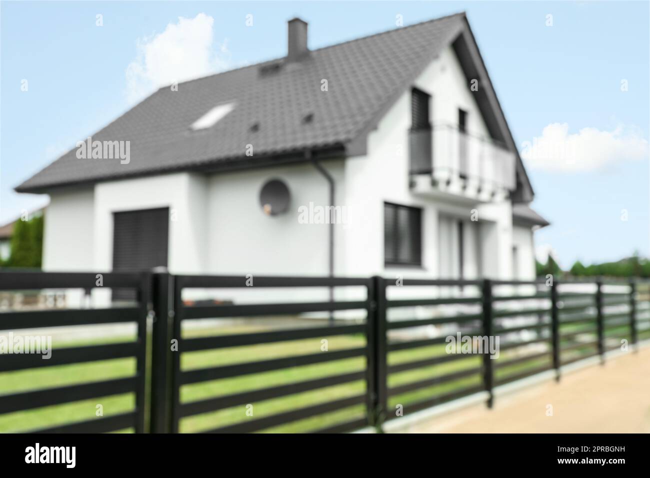 Contemporary house behind fence hi-res stock photography and images - Alamy