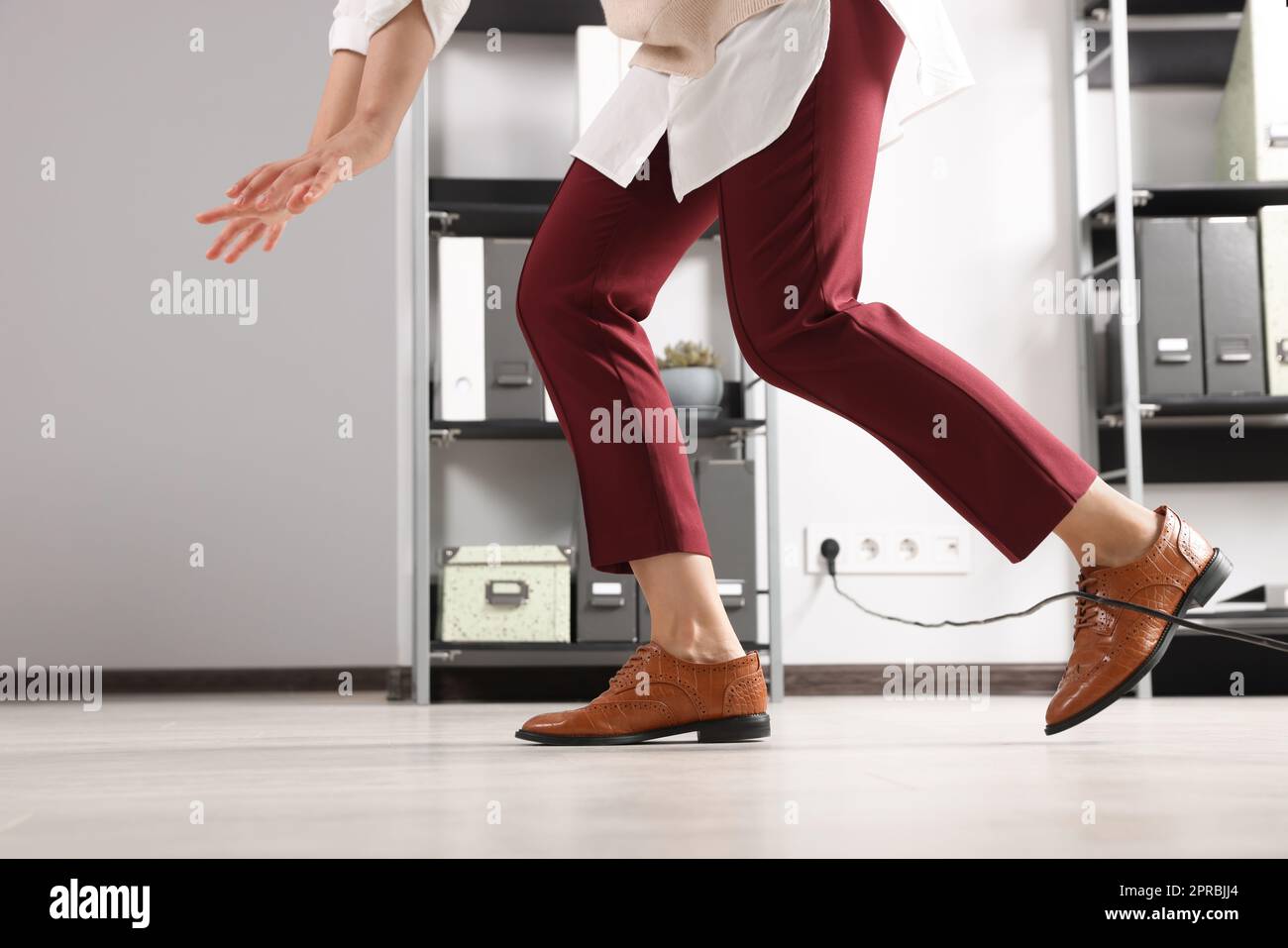 Tripping hazard office hi-res stock photography and images - Alamy