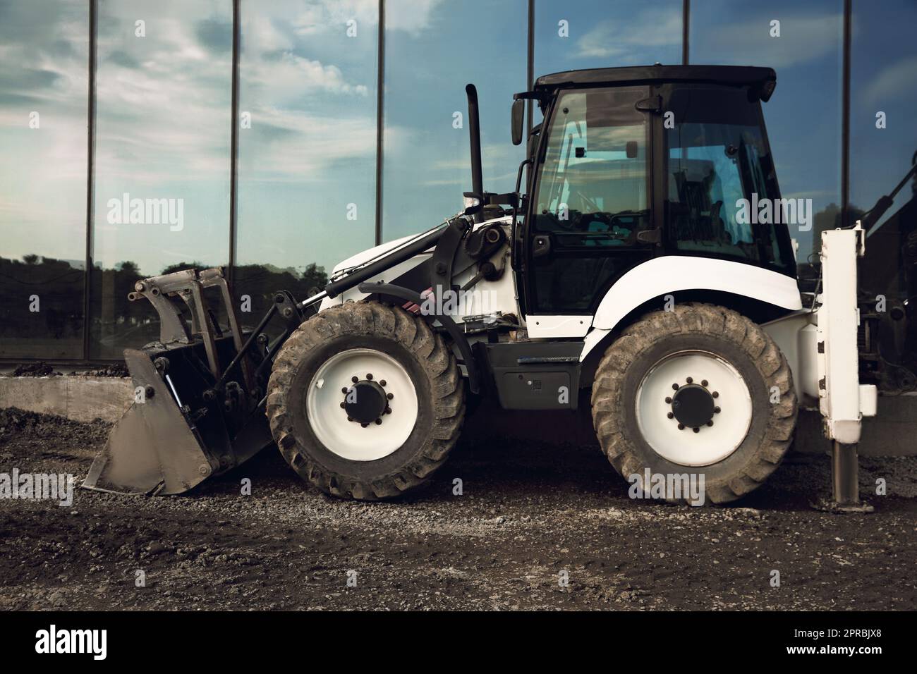 Modern skid loader on construction site outdoors Stock Photo - Alamy