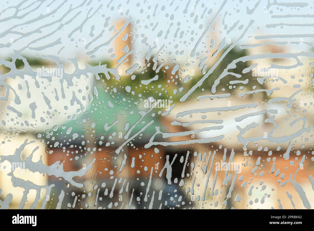 Glass covered with suds as background, view from inside Stock Photo - Alamy