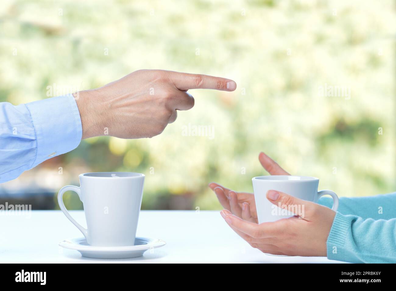 Close up of a friends hands arguing in a restaurant table Stock Photo ...
