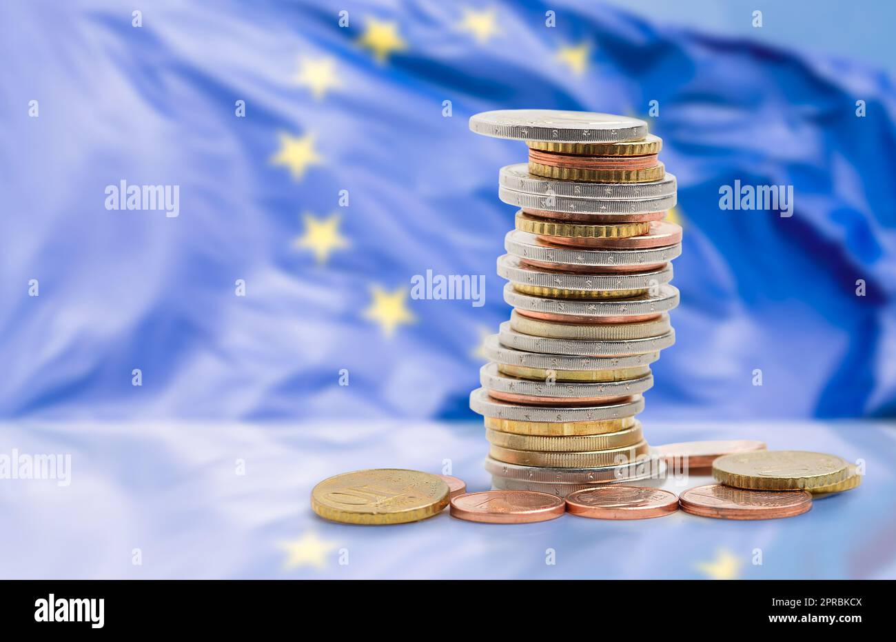 Coins stacked on each other in different positions with european union ...