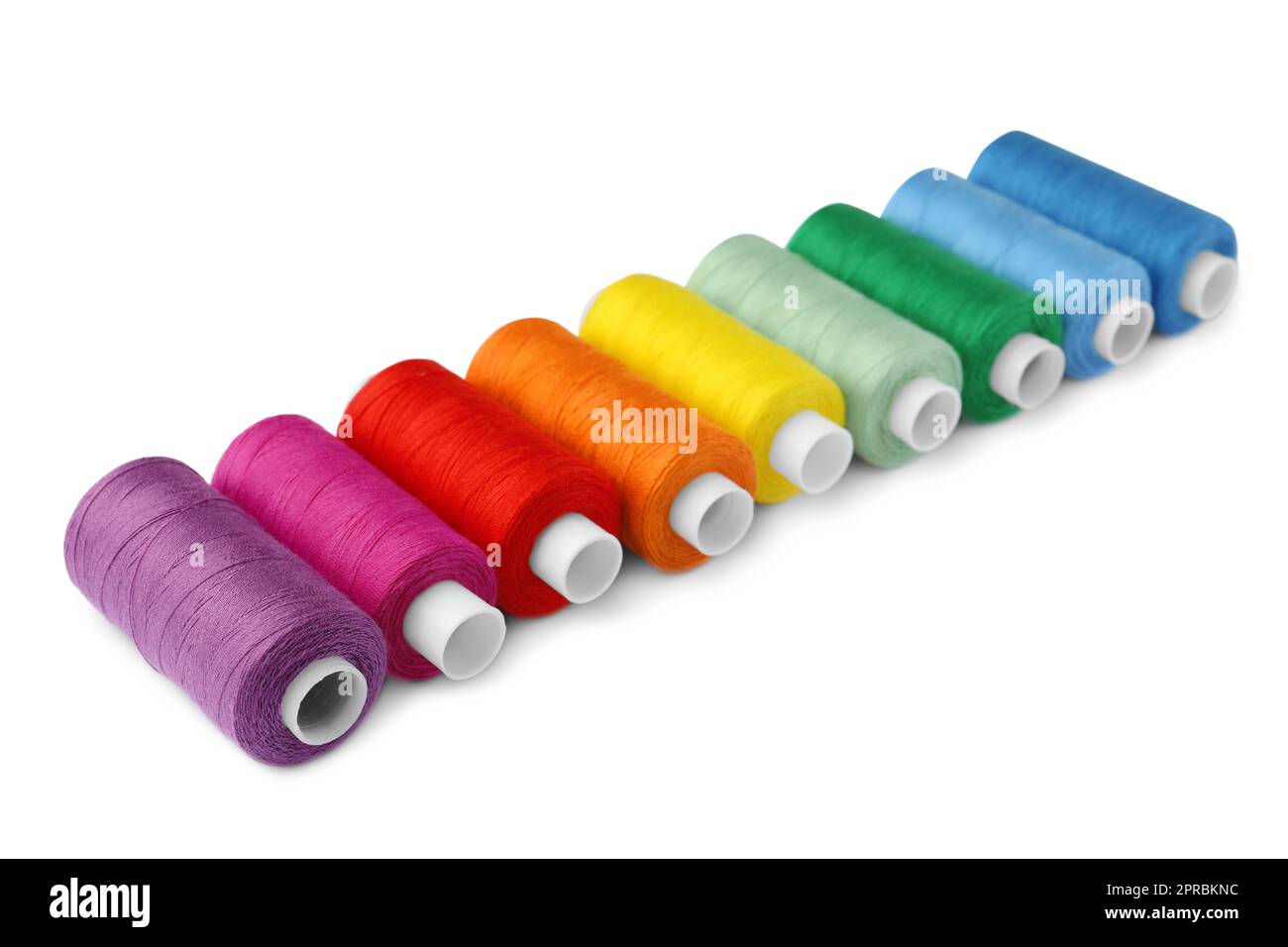 Set of different colorful sewing threads on white background Stock ...