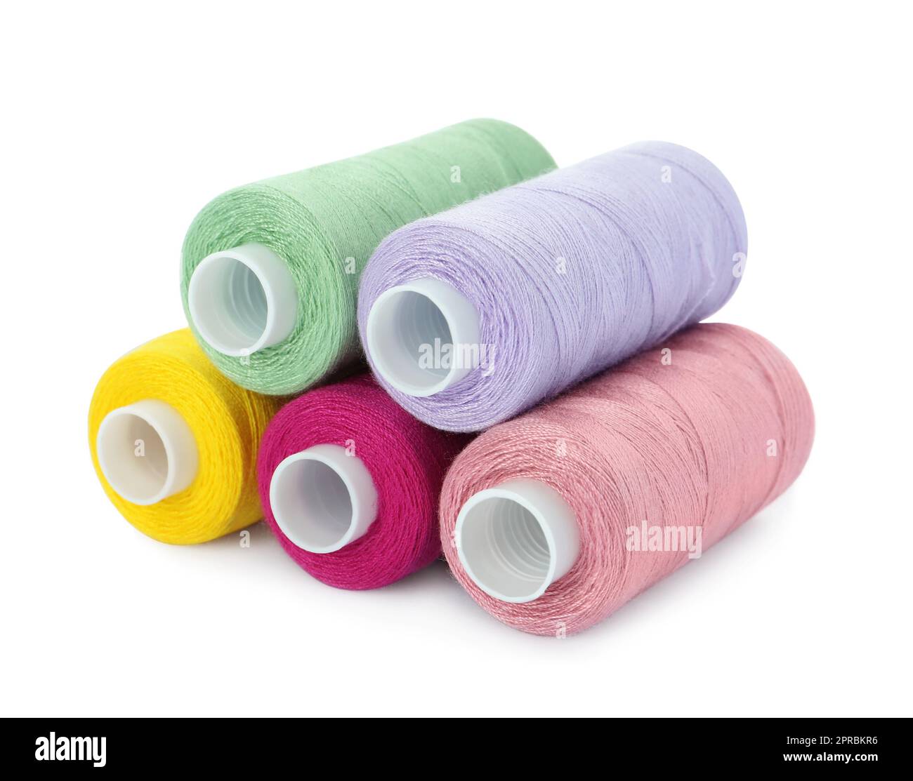 Different colorful sewing threads on white background Stock Photo - Alamy