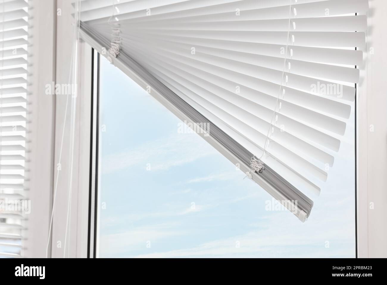 Stylish window with horizontal blinds, closeup view Stock Photo - Alamy