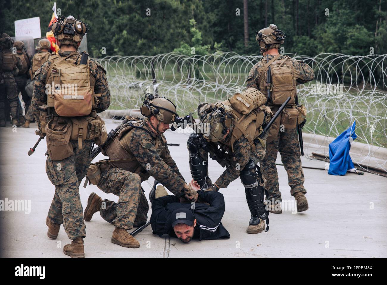 Elements of the 26th Marine Expeditionary Unit (MEU) detain a role ...