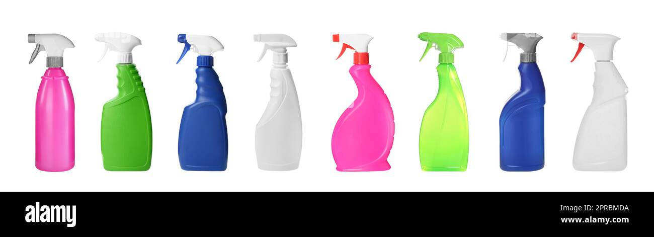 Set with bottles of different cleaning products on white background ...