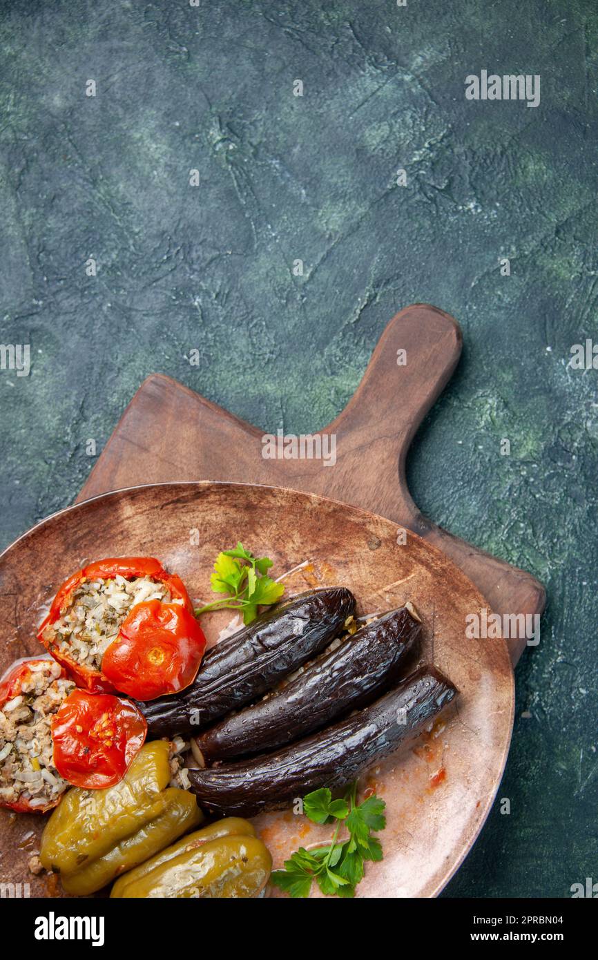 top view tasty vegetable dolma on dark blue background food dish oil ...