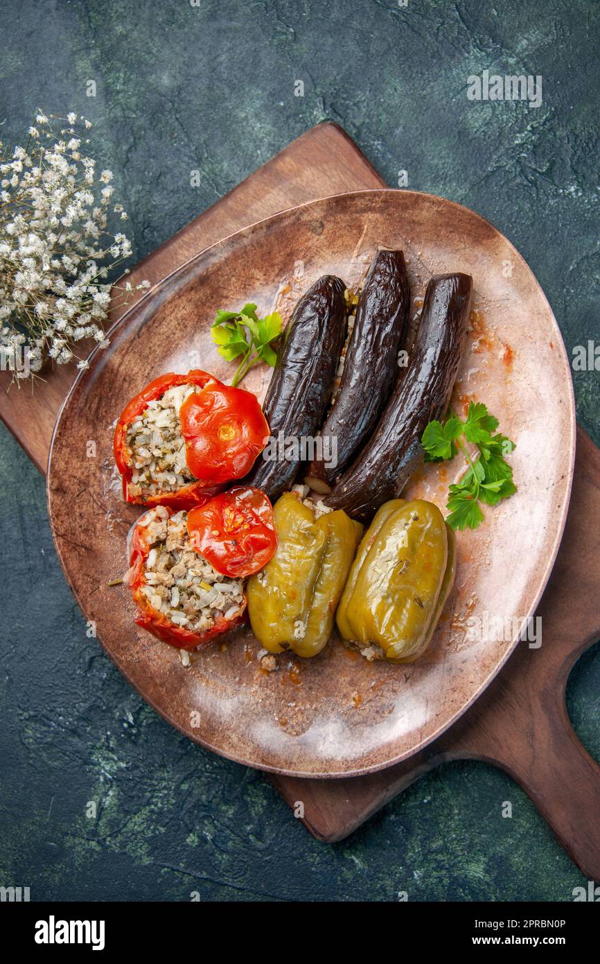 top view tasty vegetable dolma on dark blue background food dish oil ...