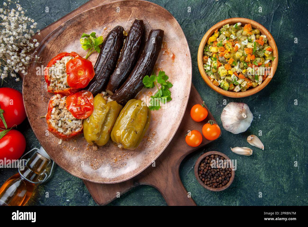 top view tasty vegetable dolma with salad on dark blue background meal ...