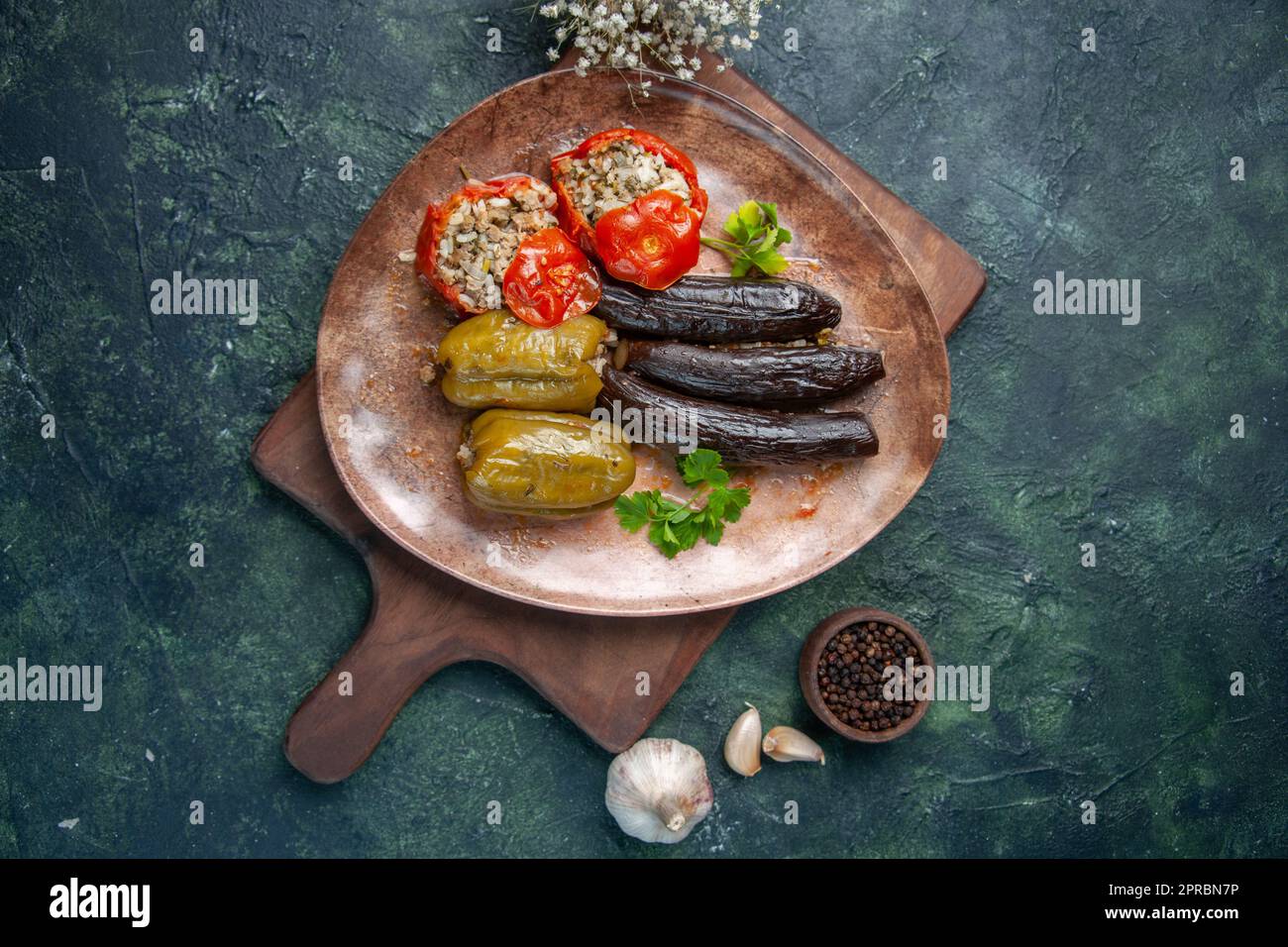 top view tasty vegetable dolma with salad on dark blue background meal ...