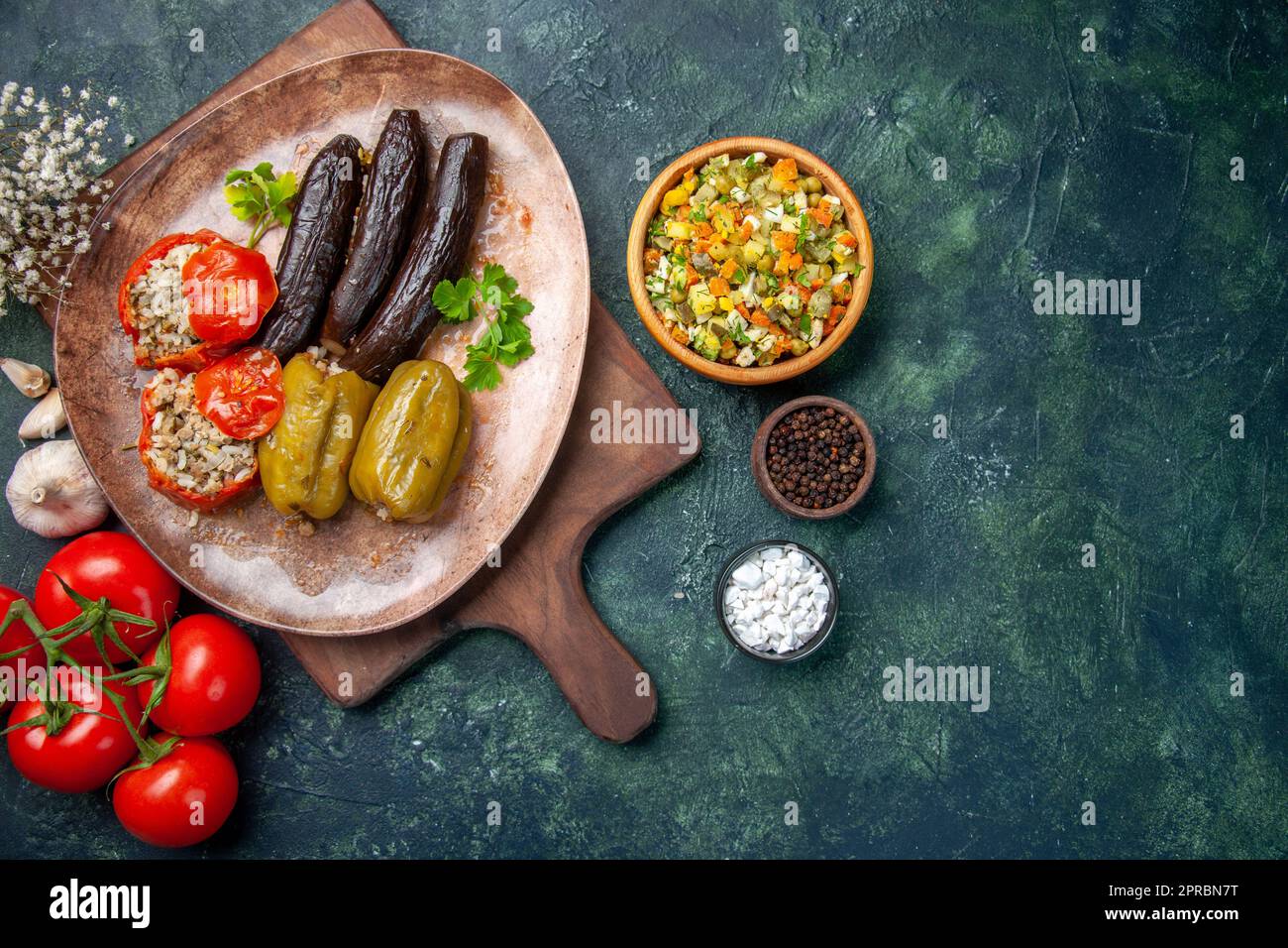 top view tasty vegetable dolma with salad on dark blue background color ...
