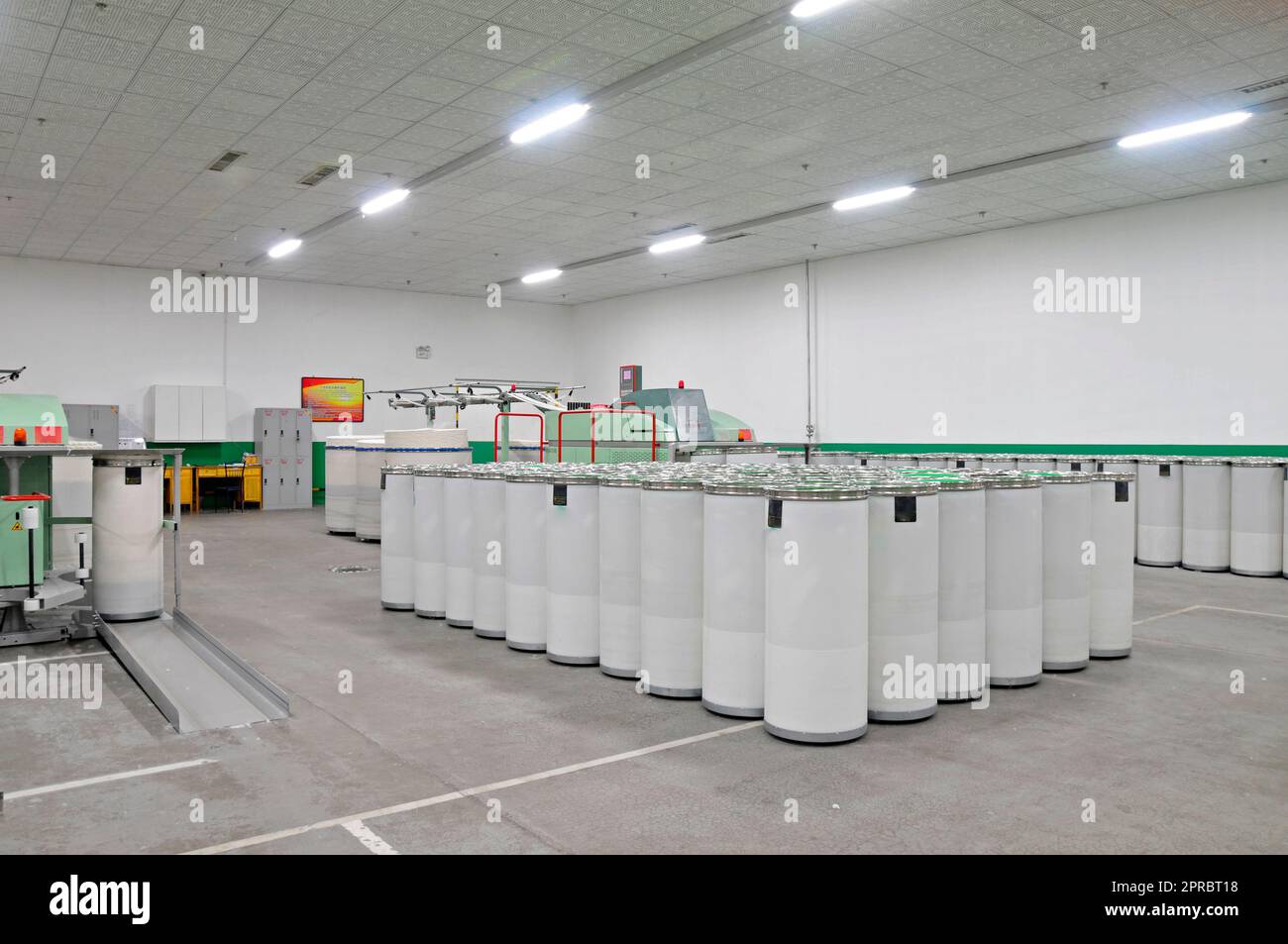 Cotton group in spinning production line factory Stock Photo - Alamy
