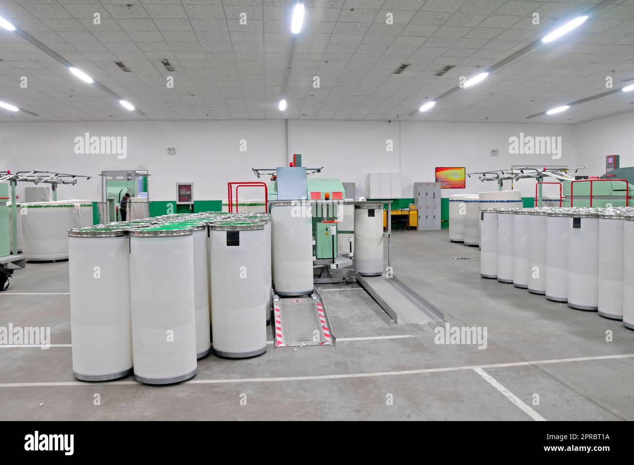 Cotton group in spinning production line factory Stock Photo - Alamy