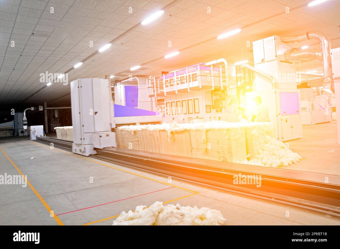 Cotton group in spinning production line factory Stock Photo - Alamy