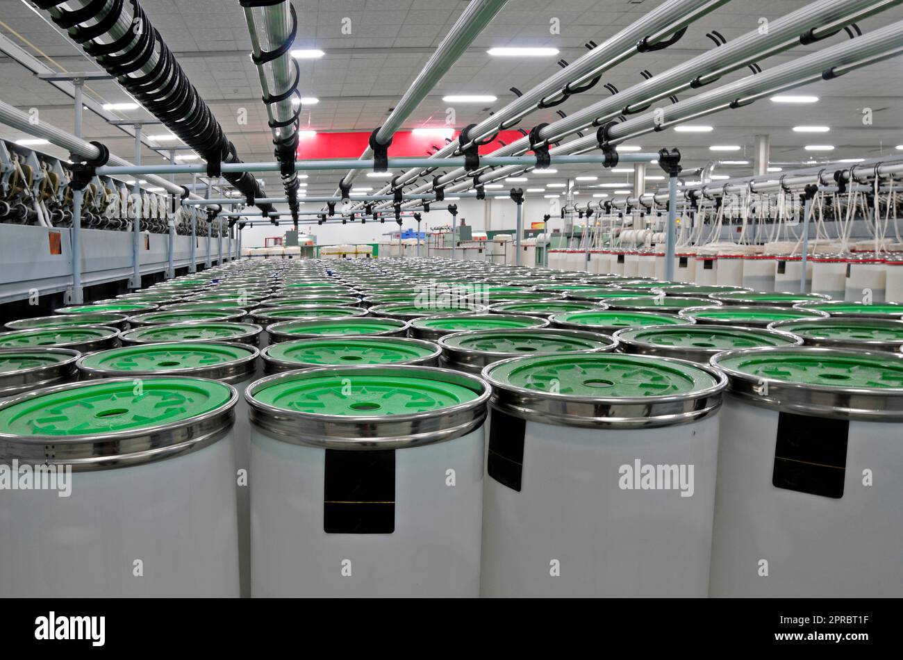 Cotton group in spinning production line factory Stock Photo - Alamy