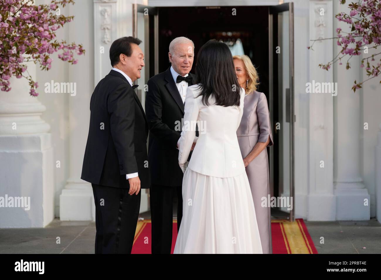 President Joe Biden and first lady Jill Biden greet South Korea's first ...