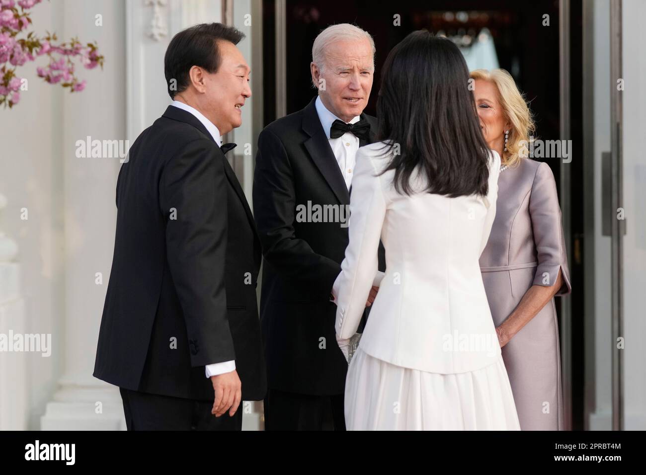 President Joe Biden and first lady Jill Biden greet South Korea's first ...