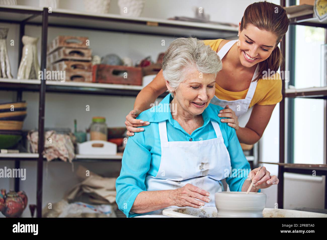 Good things come to those who craft. a senior woman making a ceramic ...