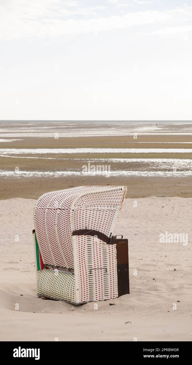 Beach wicker boxes set on white sand.Fer Island.North Sea. recreation ...