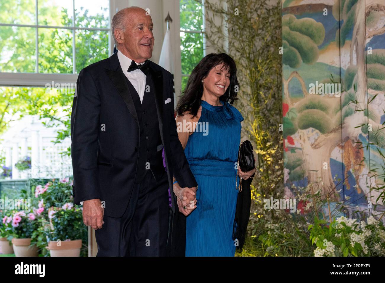 Frank Biden, left, and Mindy Ward arrive for the State Dinner with ...