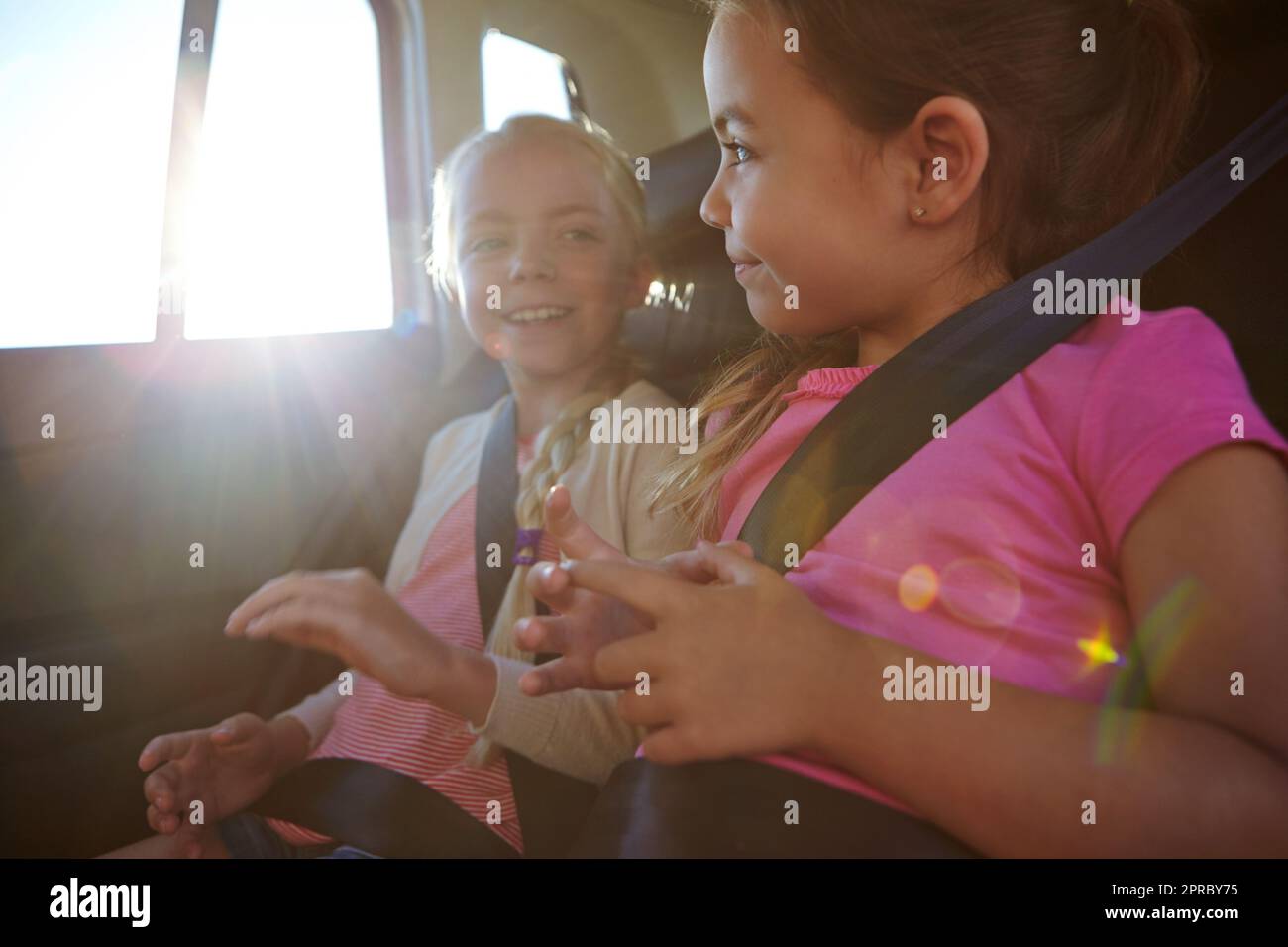 Traveling is more fun when youre together. a two little girls traveling ...