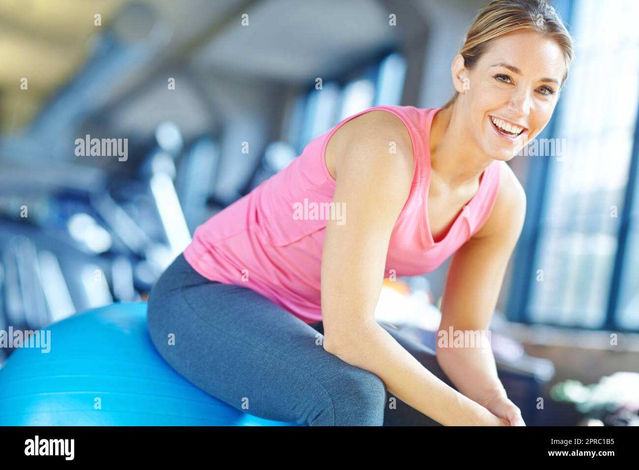 Woman taking break between workout hi-res stock photography and images ...