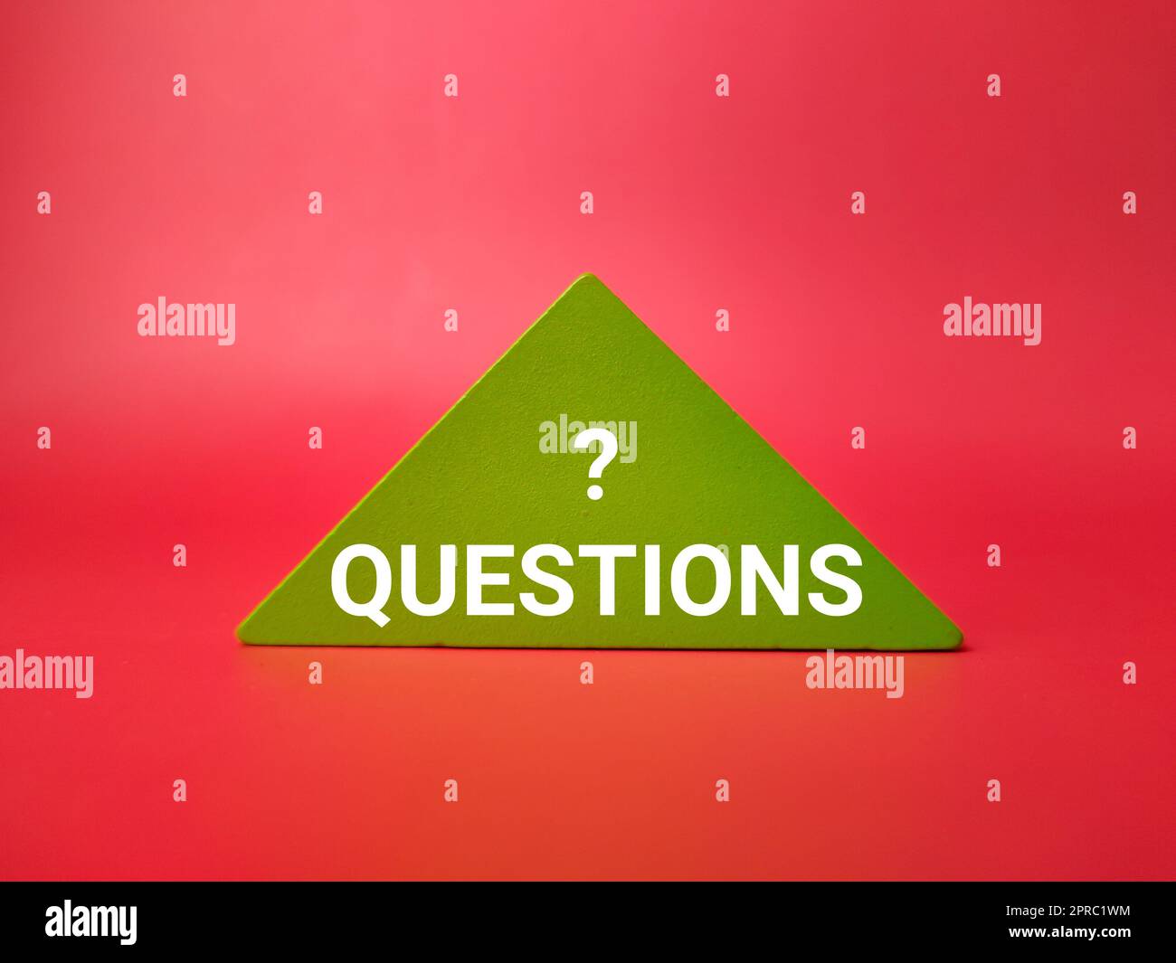 Colored wooden puzzle with the word QUESTION on red background Stock ...