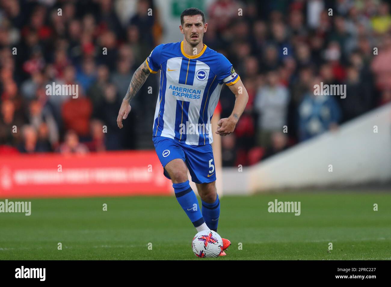 Lewis Dunk #5 of Brighton & Hove Albion in action during the Premier ...