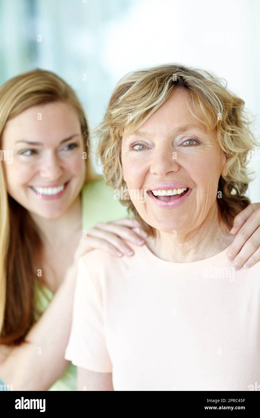 My Daughter Makes Me Smile A Smiling Senior Woman Receiving A Shoulder