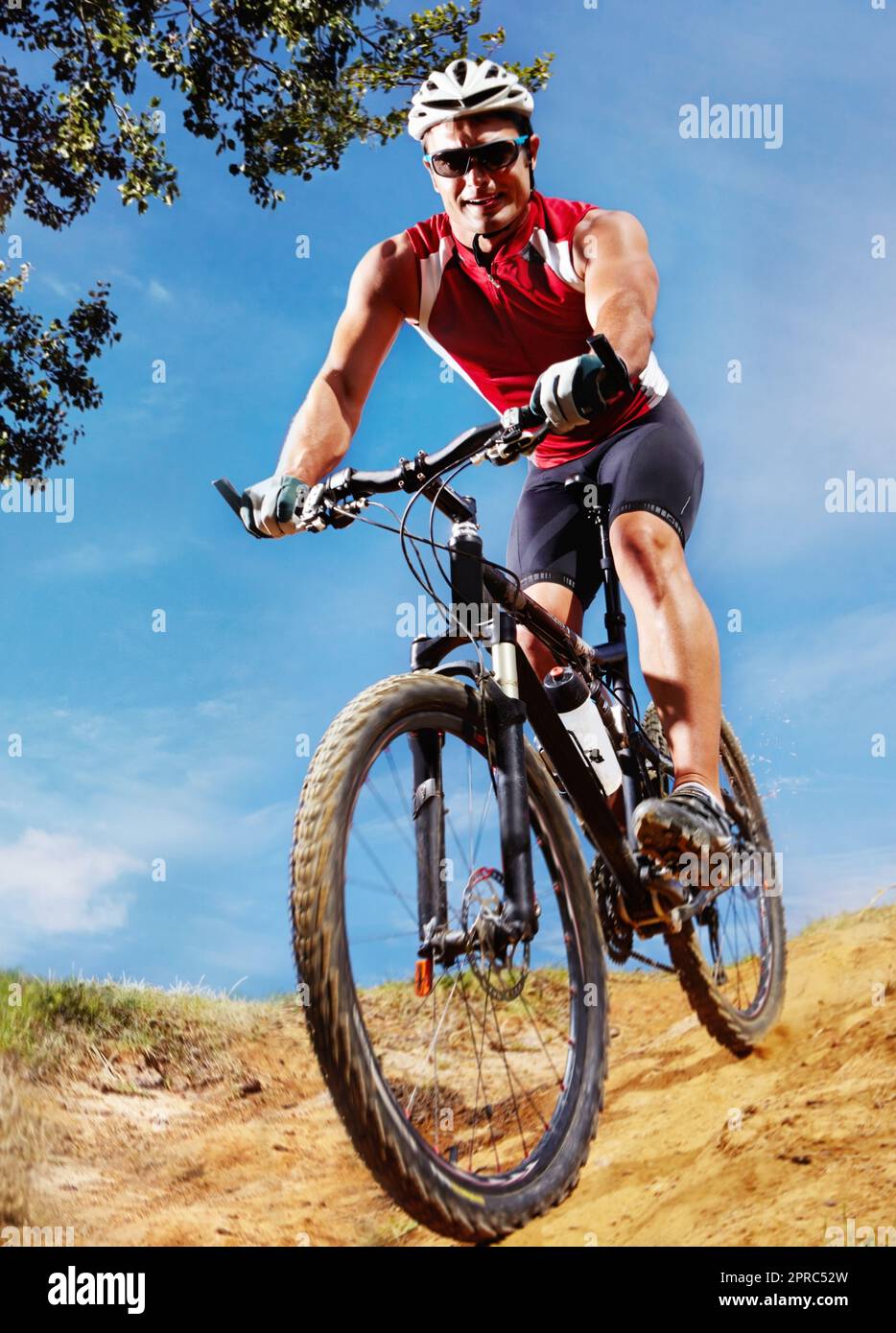 Nature and cycling. Full length shot of a sporty young man riding on ...