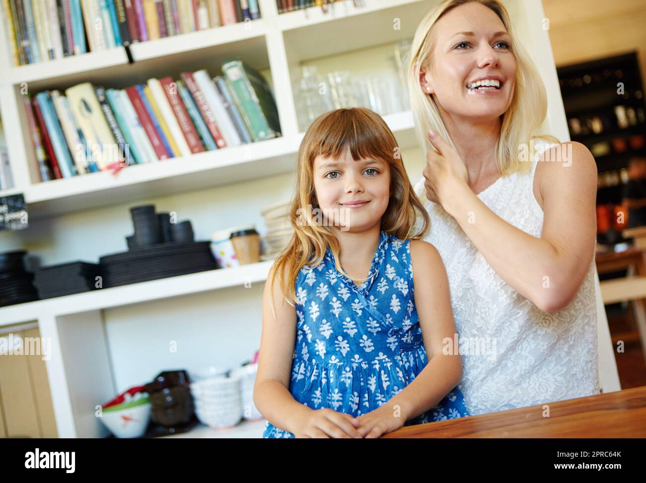 I love spending time with Mommy. a happy mother and daughter spending ...