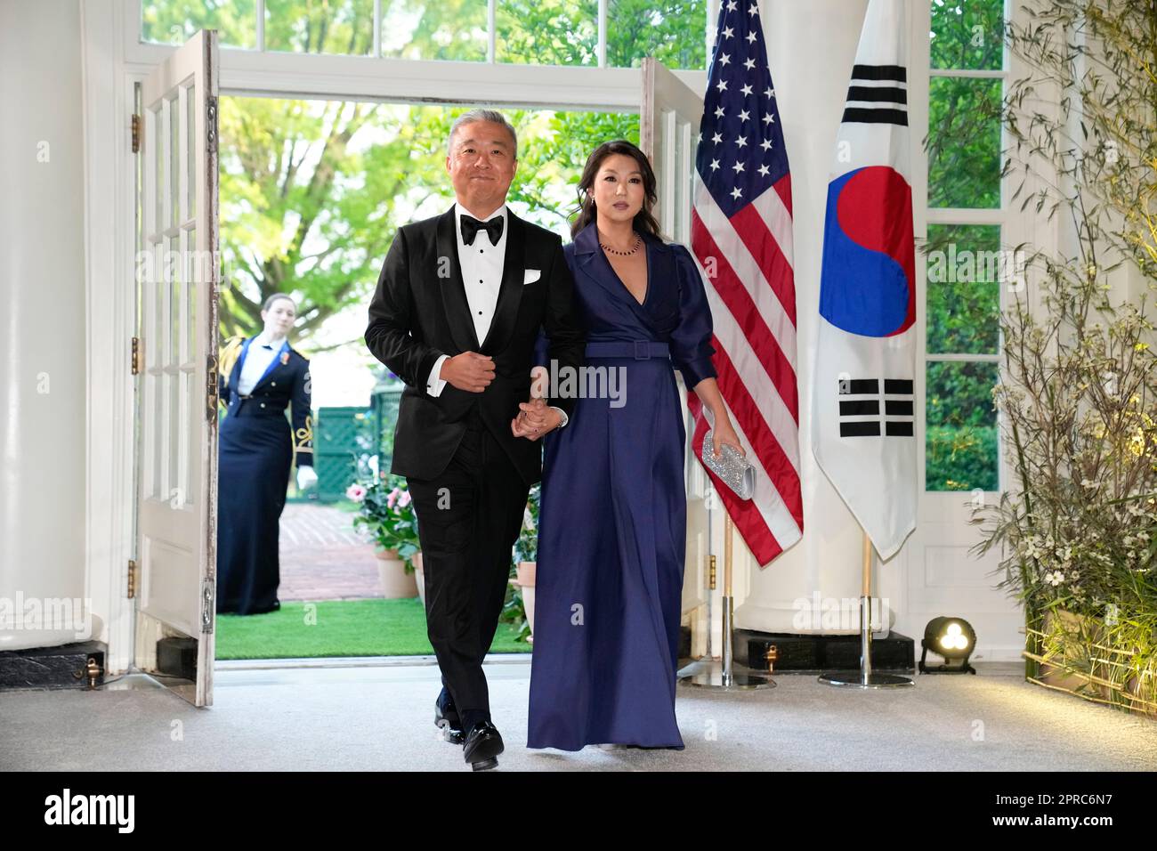 Gideon Yu and Susie Min Yu arrive for the State Dinner with President ...