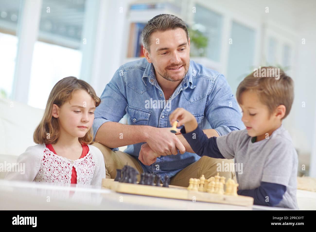 What do you think of this move Dad. a father playing a game of chess ...